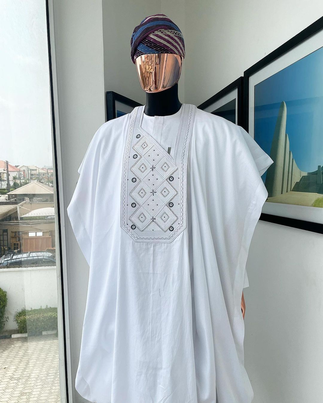 A white,Square dropping-layered embroidery design details agbada, buba ...
