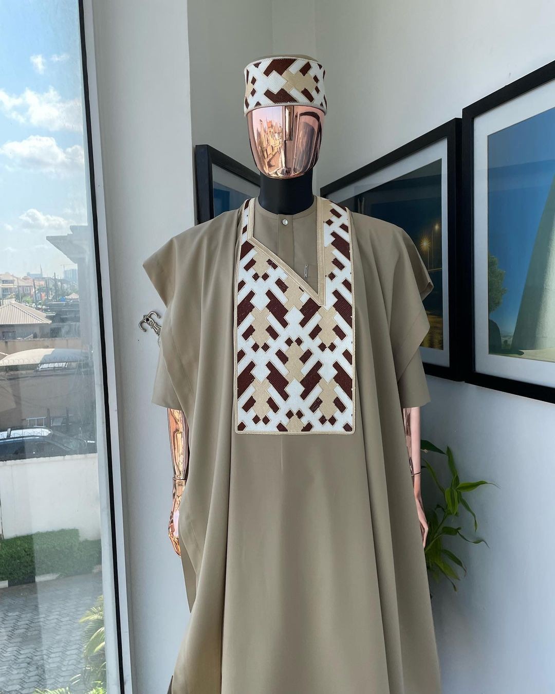 A tortilla brown, layered tettri pattern embroidery detailing agbada by ...