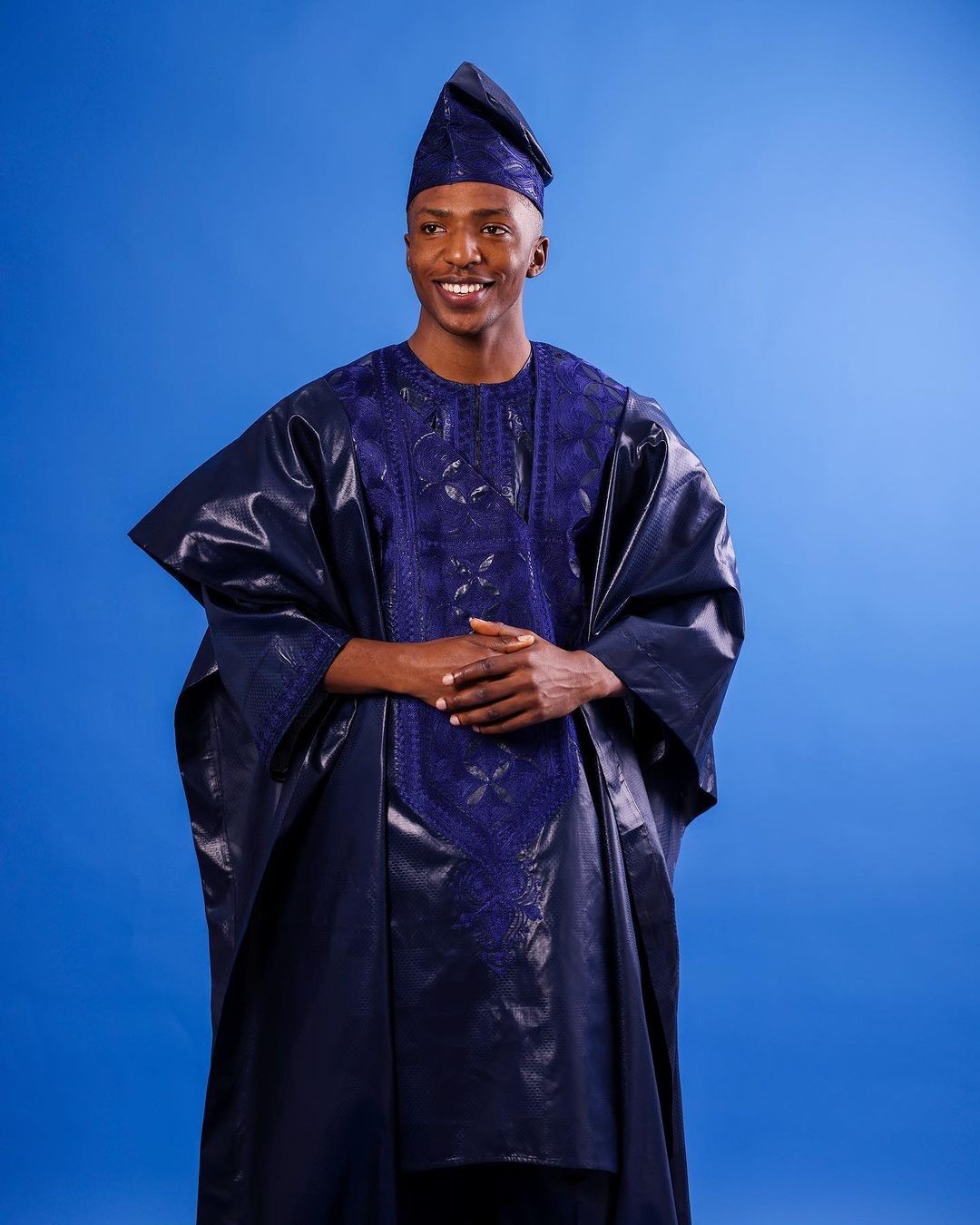 A Navy blue, arewa embroidery, front cut towards back, traditional Agba ...