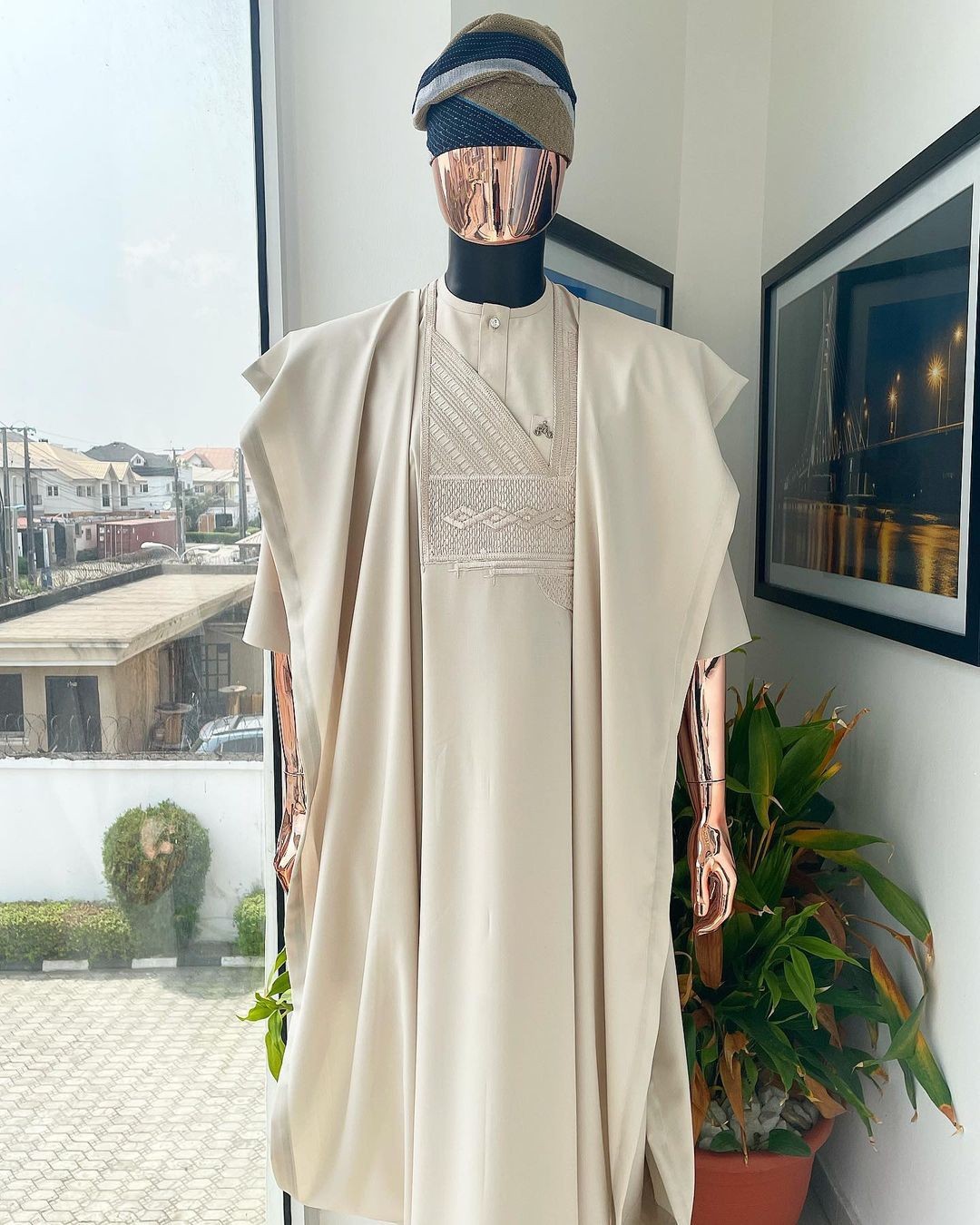 A coconut ivory, jakan design agbada, 3/4 sleeve buba laced with Swarov ...
