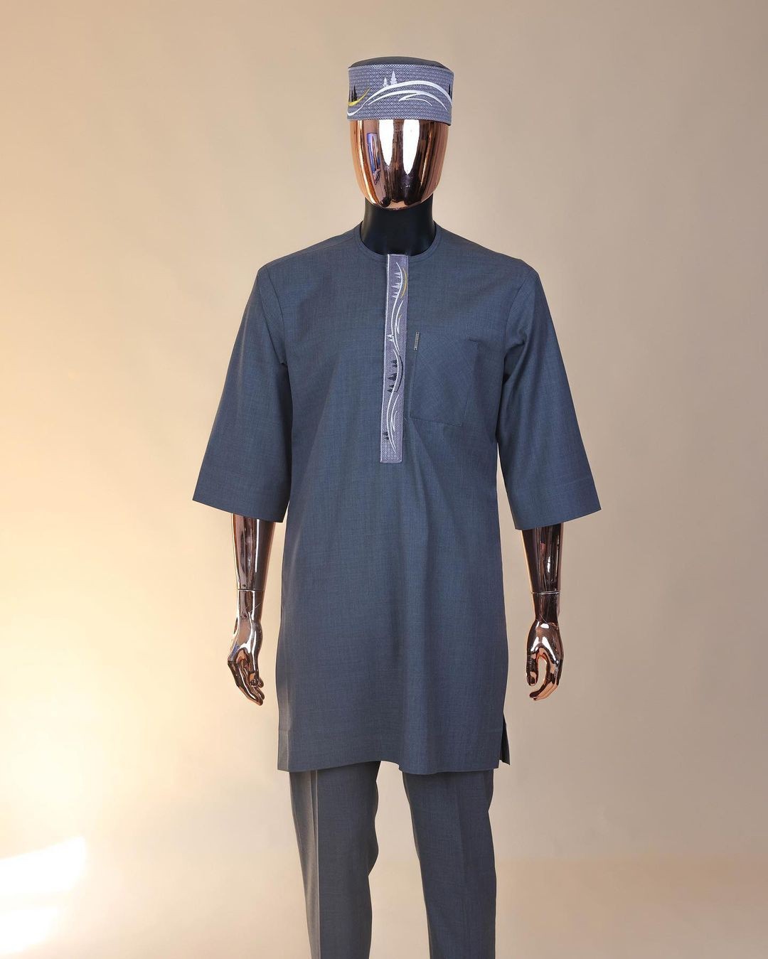 A grey, undulating lane embroidery , 3/4 sleeve African senator kaftan ...